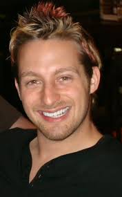 Biografia Adam Lyons